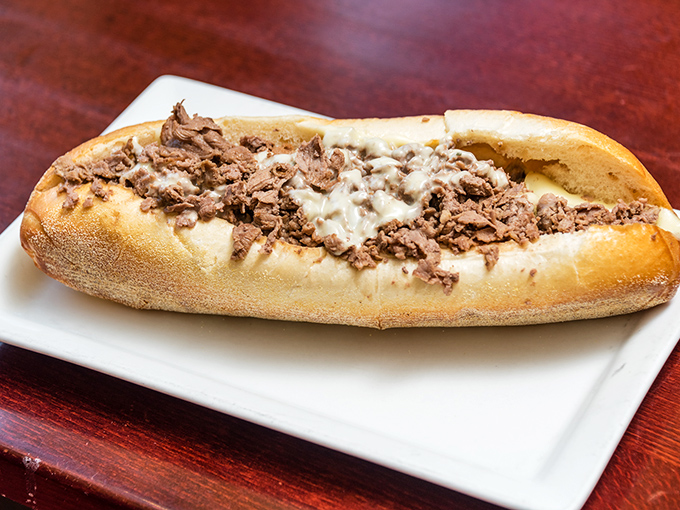 This isn't just a cheesesteak; it's Philadelphia's greatest contribution to humanity since the Liberty Bell, minus the crack.