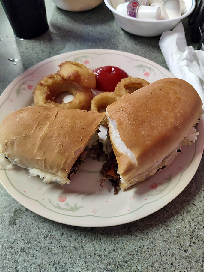 The sandwich that launched a thousand road trips. Those onion rings aren't just sides&mdash;they're golden halos of crispy perfection.