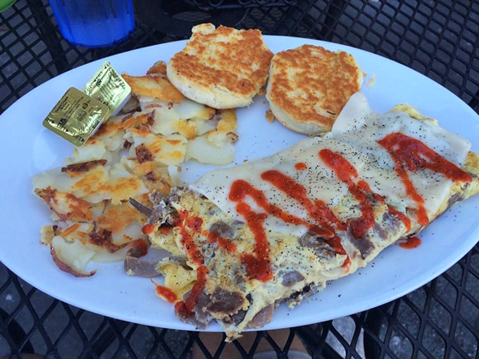 The Philly Omelet doesn't just nod to Philadelphia&mdash;it gives it a full Florida bear hug with melted cheese cascading over eggs like a yellow waterfall of joy.