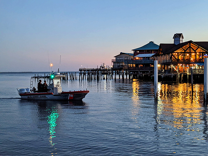 The fishing pier extends into forever, where locals cast lines and philosophical observations with equal skill.