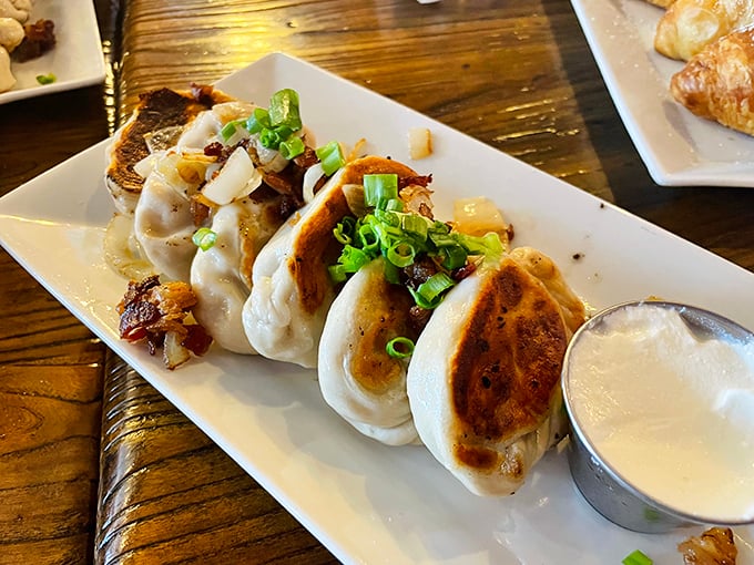 These aren't your babushka's pierogies&mdash;they're pillowy pockets of perfection with a side of dipping sauce that'll make you consider drinking it straight.