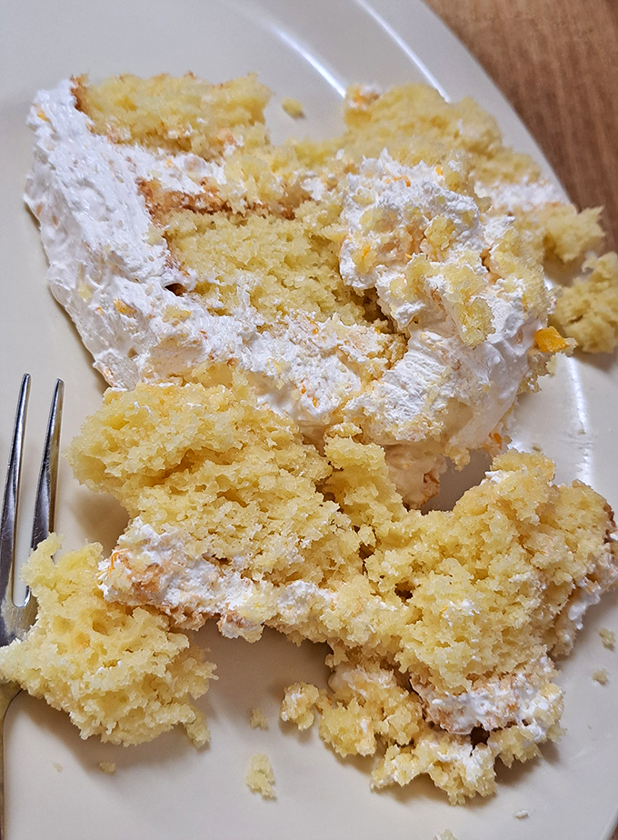 This slice of cake isn't just dessert, it's a Southern handshake. Moist yellow layers with creamy frosting that would make your grandmother beam with pride.