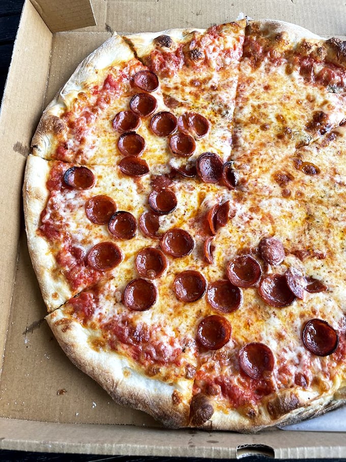 Pizza perfection isn't complicated: just the right char on the crust, quality cheese melted to golden bubbles, and pepperoni curled into little flavor cups.