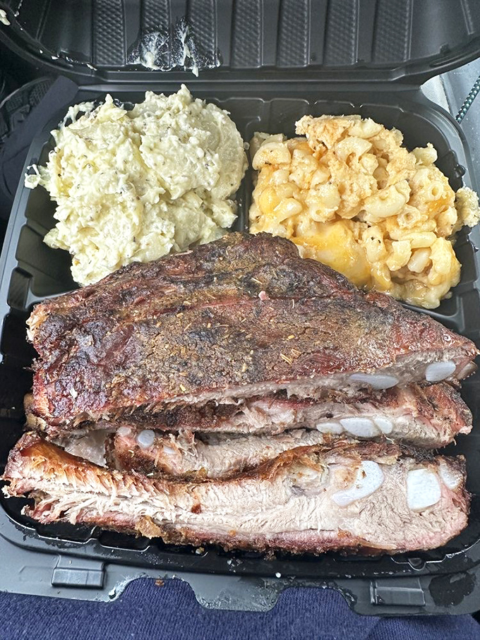 Behold the brisket platter with potato salad and mac and cheese&mdash;a holy trinity of comfort that would make even a Texan tip their hat.