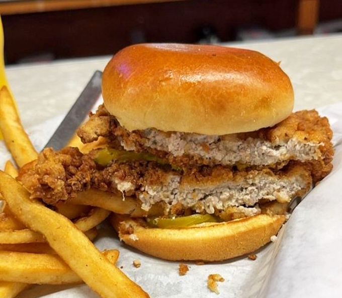 Indiana's beloved pork tenderloin sandwich&mdash;where the meat heroically extends beyond the bun's borders like it's trying to escape, but you'll catch every delicious bite.