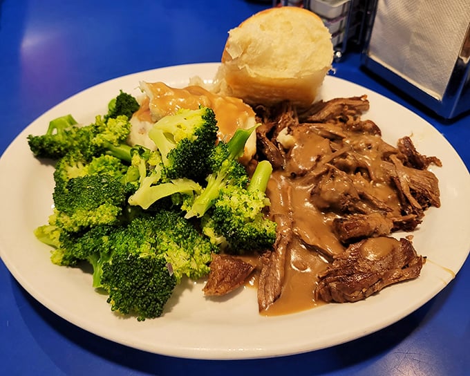 The Thursday pot roast that launched a thousand food dreams. Tender beef surrendering to your fork while that gravy performs flavor miracles.