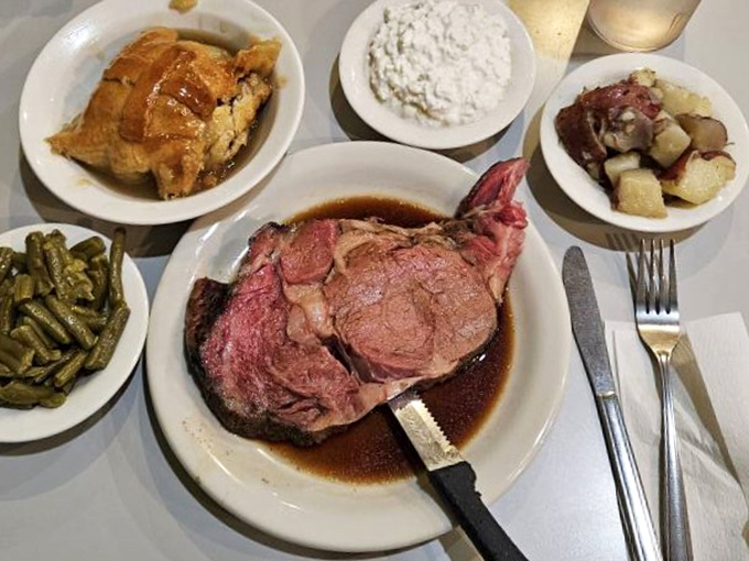 Prime rib swimming in its own juices, accompanied by sides that deserve their own standing ovation.