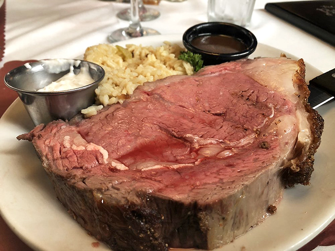 This prime rib isn't just cooked&mdash;it's honored. The rosy interior and seasoned crust pair beautifully with fluffy rice pilaf and house sauce.