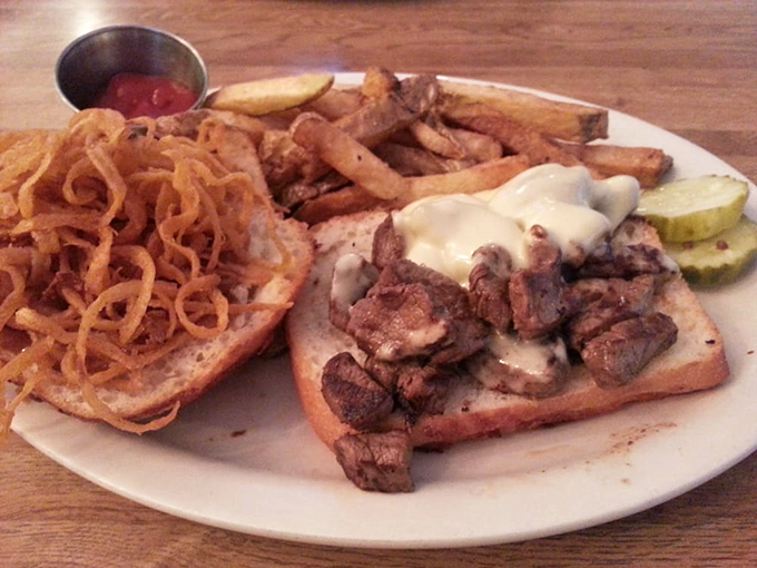 The open-faced prime rib sandwich isn't just lunch; it's an architectural marvel of meat, bread, and melted cheese that demands both a knife and fork.