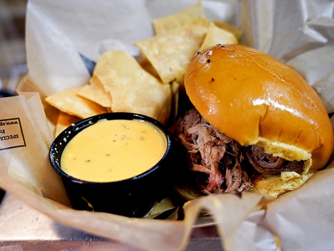 This pulled pork sandwich isn't just a meal, it's a commitment. The kind of relationship where "till death do us part" seems entirely reasonable.