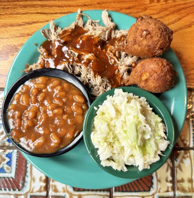 Southern hospitality on a plate&mdash;pulled pork, baked beans, and coleslaw form the holy trinity of comfort food done right.