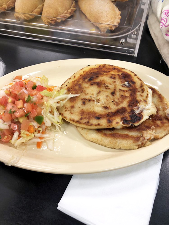 These golden-brown pupusas with crisp, colorful slaw demonstrate why simple street food, when done right, can outshine any five-star creation.