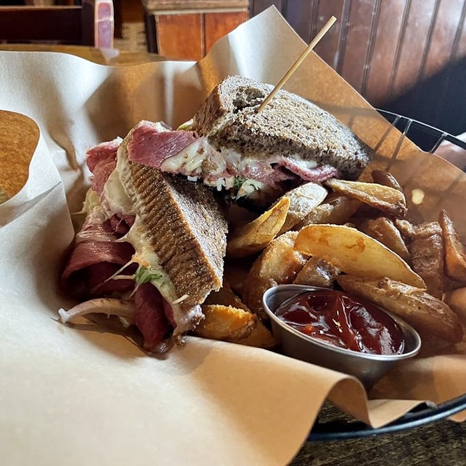 This isn't just a sandwich; it's architecture. The Reuben stands tall with layers of corned beef and melty cheese between perfectly grilled rye.
