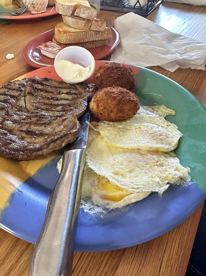 The ribeye and eggs plate answers that eternal question: "Why choose between breakfast and dinner when you can have both?" Pure protein paradise.