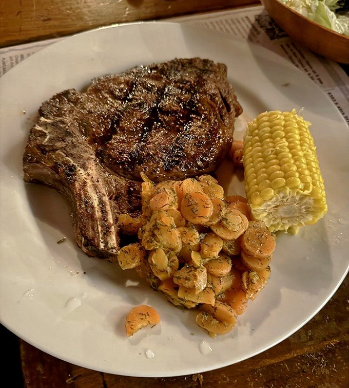 A perfectly seared ribeye that makes vegetarians question their life choices. The char marks tell stories of flame-kissed perfection that words simply can't capture.