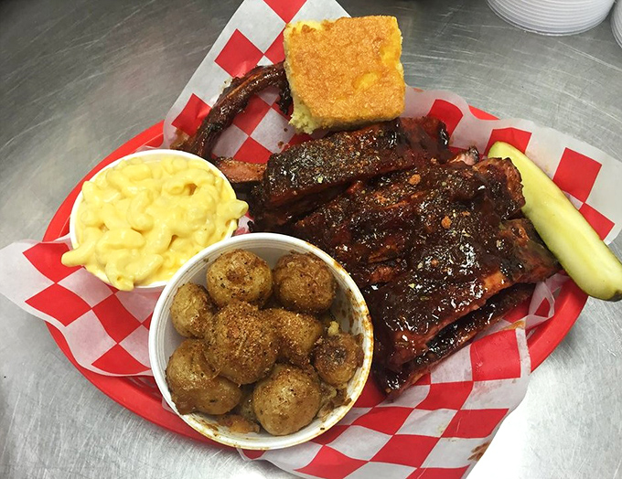 Ribs that glisten with purpose, mac and cheese that demands attention, and cornbread that says, "Yeah, I belong at this party."