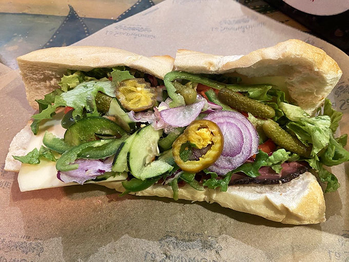 This isn't just a sandwich; it's architecture. Layers of vegetables stacked with scientific precision, creating a perfect balance of texture and flavor.