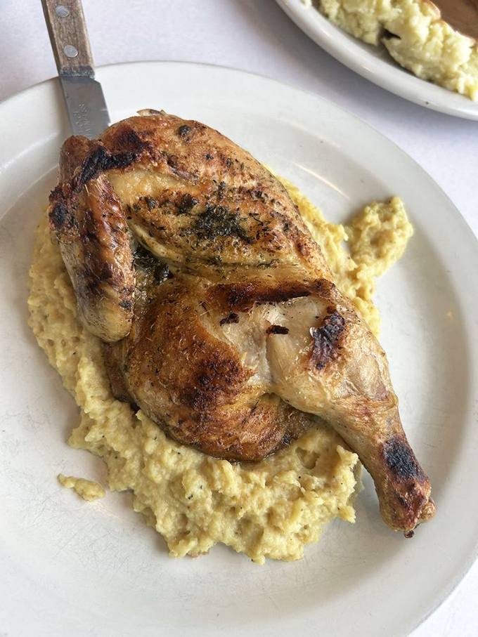 When a roasted chicken meets creamy grits, it's like a culinary first date that was clearly meant to be.