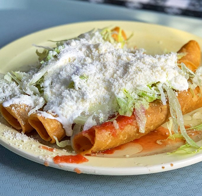 Rolled tacos that make a mockery of every late-night frozen version you've ever microwaved. The cheese-to-crunch ratio is mathematical perfection.