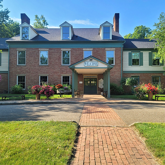 The visitor center's welcoming entrance and manicured gardens set the stage for your journey into Ohio's canal era.