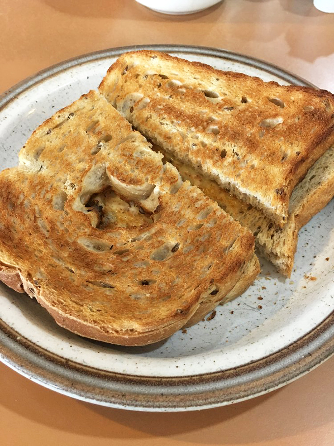 Toast isn't just toast at Jimmy's&mdash;it's a golden-brown canvas waiting for a schmear of butter and your breakfast dreams.