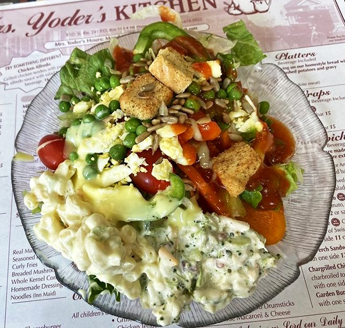 A salad bar that proves vegetables can be exciting too. This plate has more colors than a Crayola factory explosion.