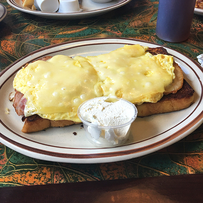 Eggs and ham on toast&mdash;a simple pleasure elevated to art form. That side of cream cheese says "we don't do basic here."