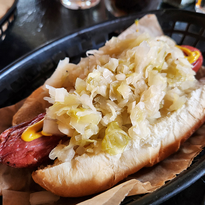 Sauerkraut and mustard: the dynamic duo of hot dog toppings. This tangy mountain of fermented goodness transforms a simple frank into a Cleveland masterpiece.