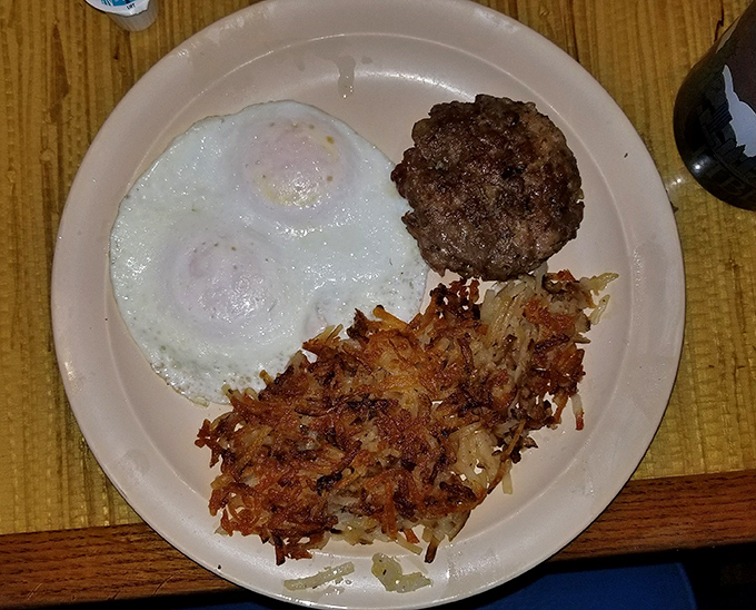 Breakfast of champions! When a perfectly fried egg meets crispy hash browns and a hearty sausage patty, Monday mornings suddenly seem manageable.