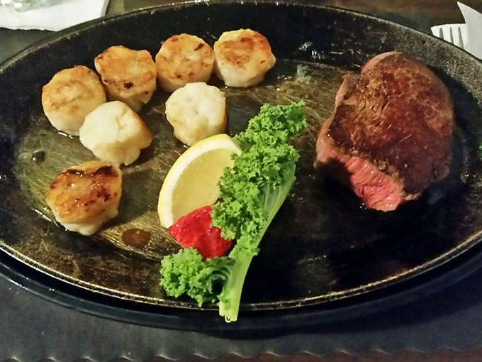 These scallops and steak share a plate but compete for your attention. The scallops, perfectly seared, might just win this delicious battle.