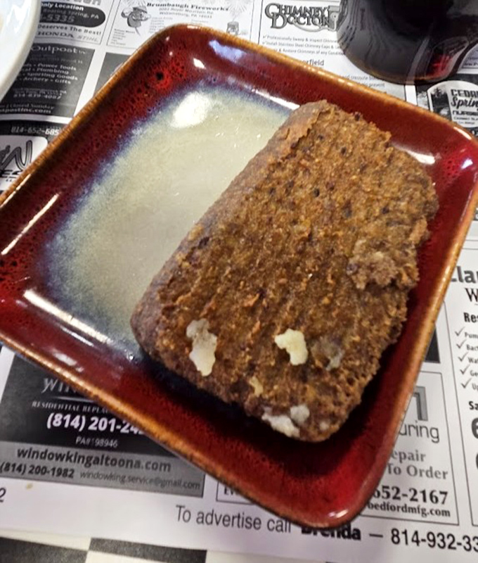 Scrapple: Pennsylvania's answer to "waste not, want not." A crispy-edged breakfast tradition that divides families but unites food lovers.