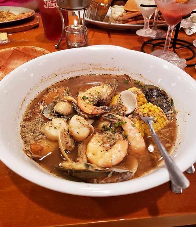 This seafood boil brings all the ocean's greatest hits to one bowl. Shrimp, clams, and corn comingling in broth that's worth drinking straight when no one's looking.