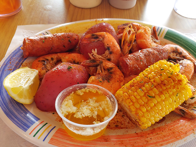 When seafood meets Southern hospitality, this colorful boil becomes pure edible joy on a single magnificent plate.