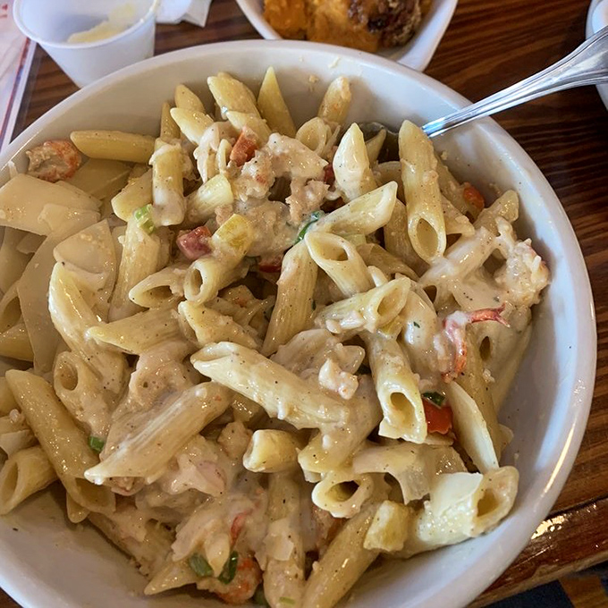 Pasta that doesn't know it's in Georgia, not Italy. Creamy, seafood-studded penne that would make your Italian grandmother nod in reluctant approval.