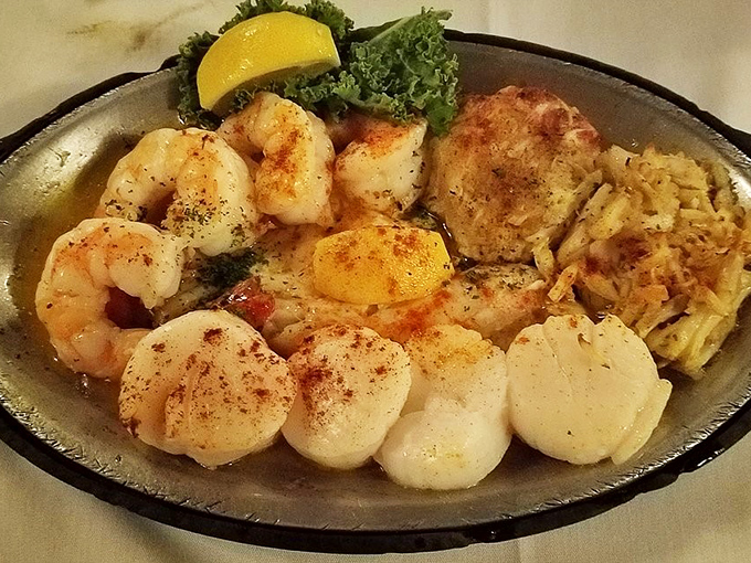 The seafood platter that answers the eternal question: "Why choose one ocean treasure when you can have them all?" Scallops, shrimp, and crab living harmoniously.