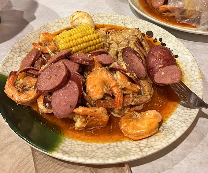 The seafood boil arrives like a greatest hits album of the ocean&mdash;shrimp, sausage, corn, and potatoes swimming in a spicy broth that demands to be sopped up with bread. 