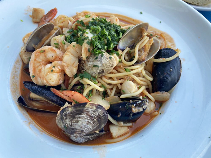 Seafood linguine that looks like Neptune himself arranged it&mdash;each shellfish perfectly cooked in that aromatic broth.