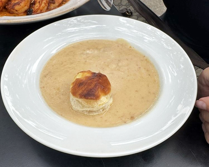 She-Crab Soup that would make Charleston jealous. That golden pastry island floating in creamy seafood heaven is worth the trip alone.
