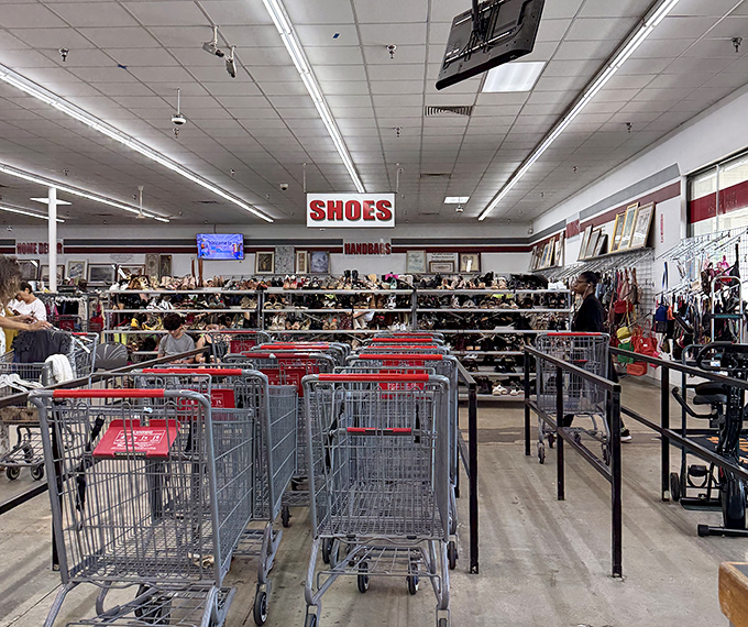 The shoe section: a footwear United Nations where Italian loafers mingle with sensible sneakers. Cart corrals stand ready for serious shoppers on their treasure-hunting expeditions. 