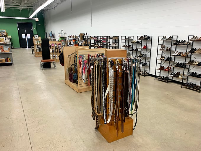 The accessories section is meticulously organized, with belts and shoes displayed like a boutique rather than a bargain basement.