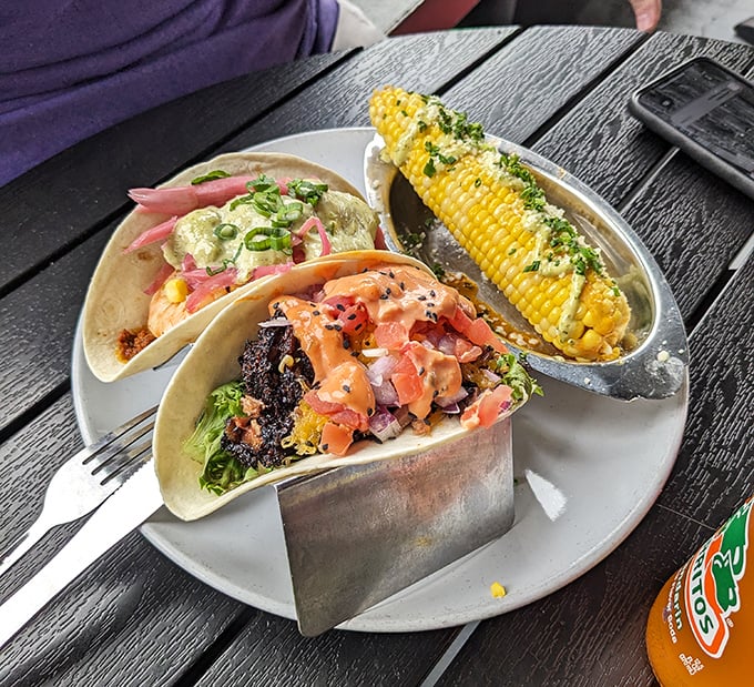 Taco Tuesday meets barbecue brilliance with these flavor-packed handheld treasures. That corn on the side isn't playing a supporting role&mdash;it's stealing scenes.