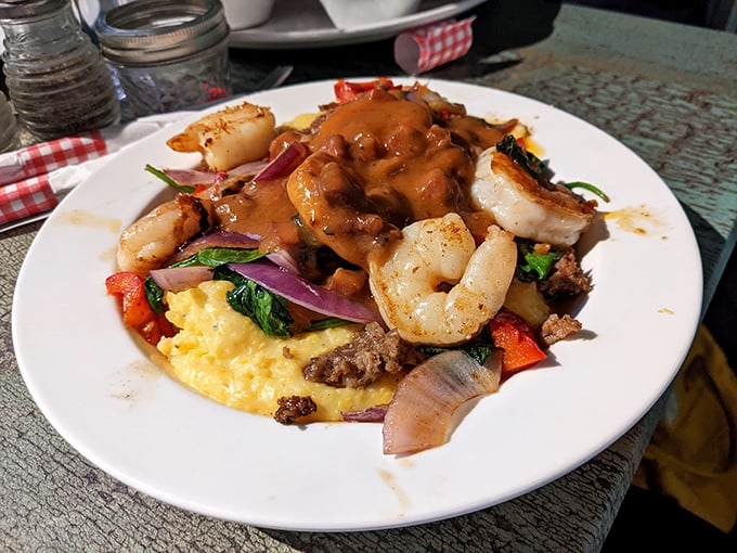 Shrimp and grits that would make a New Orleans chef tip their hat&mdash;plump shrimp lounging on a bed of cheesy grits like they own the place.