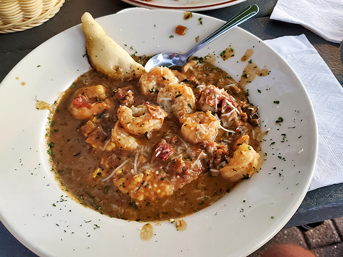 This isn't just shrimp and grits; it's a Southern love letter written in seafood and cream that would make even a Yankee swoon.