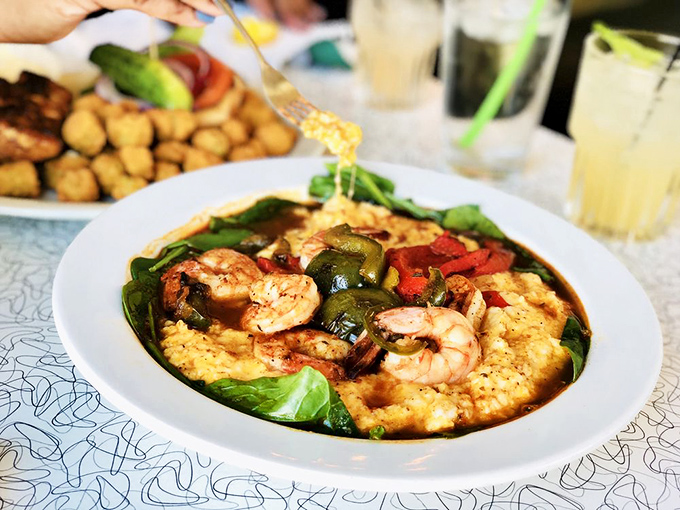 Shrimp and grits that would make a Southerner weep with joy&mdash;plump shrimp nestled on creamy grits with vegetables adding pops of color like confetti at a flavor party.