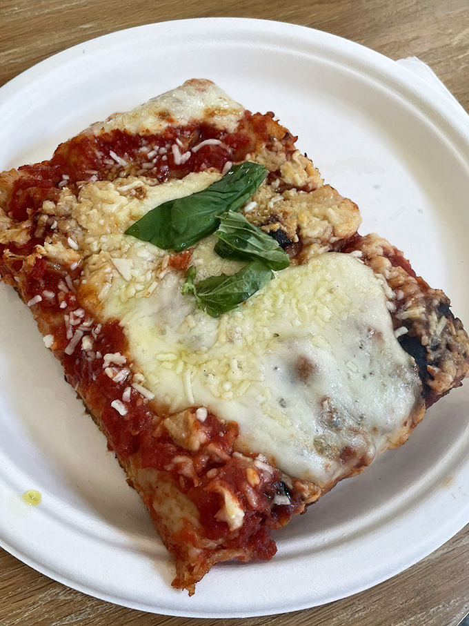 Square-cut Sicilian-style pizza that proves geometry can indeed be delicious. Each corner piece is worth fighting your dining companions for.