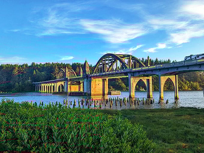 The iconic Siuslaw River Bridge stands as Florence's architectural celebrity, photobombing river views since 1936 with art deco flair.