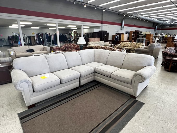 Sectional serenity! This pristine light gray sofa could be the centerpiece of your living room for less than the cost of a fancy dinner date.