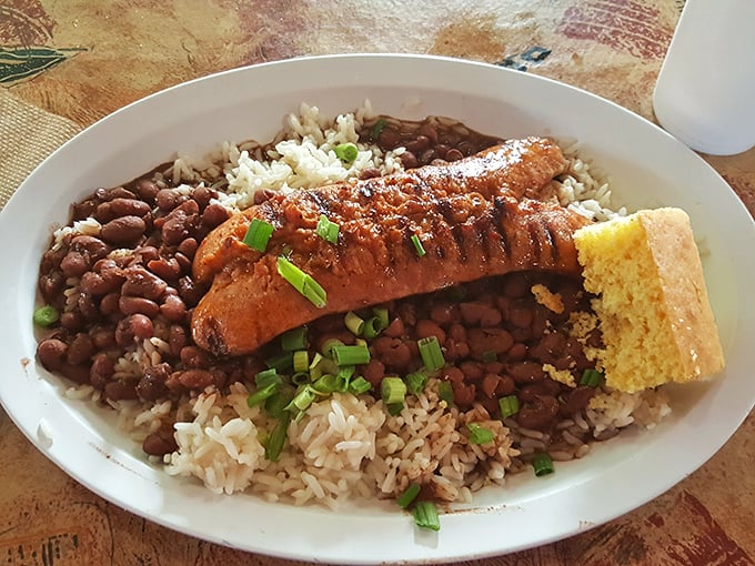 Red beans and rice with sausage – the holy trinity of Southern comfort. That cornbread on the side isn't just a garnish, it's an essential sauce-sopping tool.