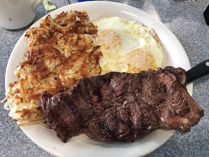 A proper steak and eggs plate that says, "Good morning, you deserve this." Those hash browns could make a potato farmer weep with pride.
