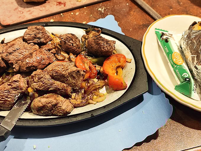 Steak that speaks for itself&mdash;no fancy plating required when the meat is this good, served sizzling hot with perfectly caramelized vegetables.